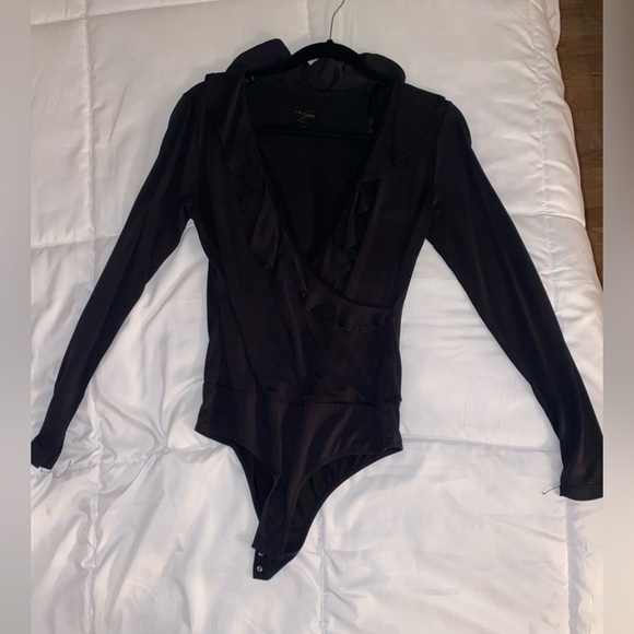 Tops | Black Ruffle Low Cut Bodysuit | Poshmark